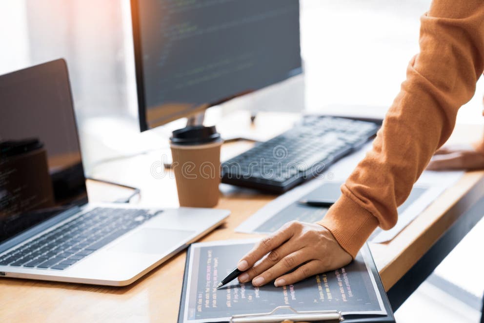 Pensive Programmer Working on on Desktop Pc Programming Code Technologies or Website Design at ...