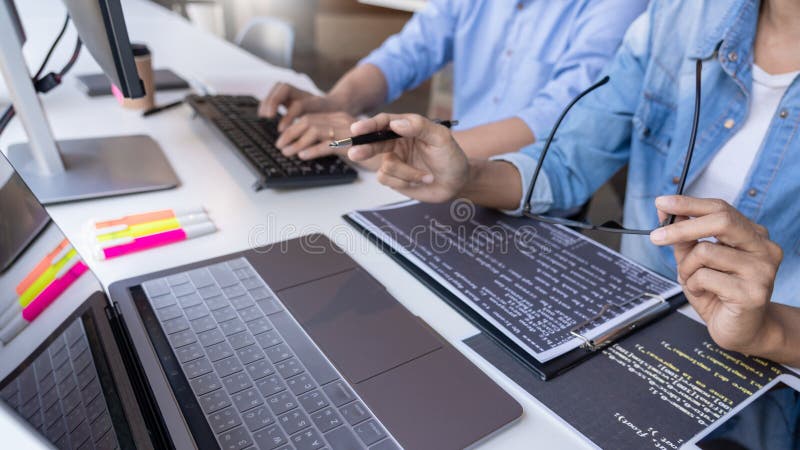 Pensive Programmer Working On On Desktop Pc Programming Code Technologies Or Website Design At