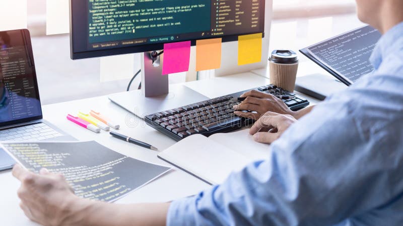 Pensive Programmer Working On On Desktop Pc Programming Code Technologies Or Website Design At