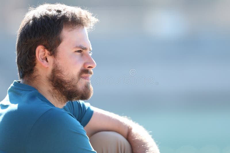 Pensive Relaxed Man Contemplating Views Sitting in a Lake Stock Photo ...