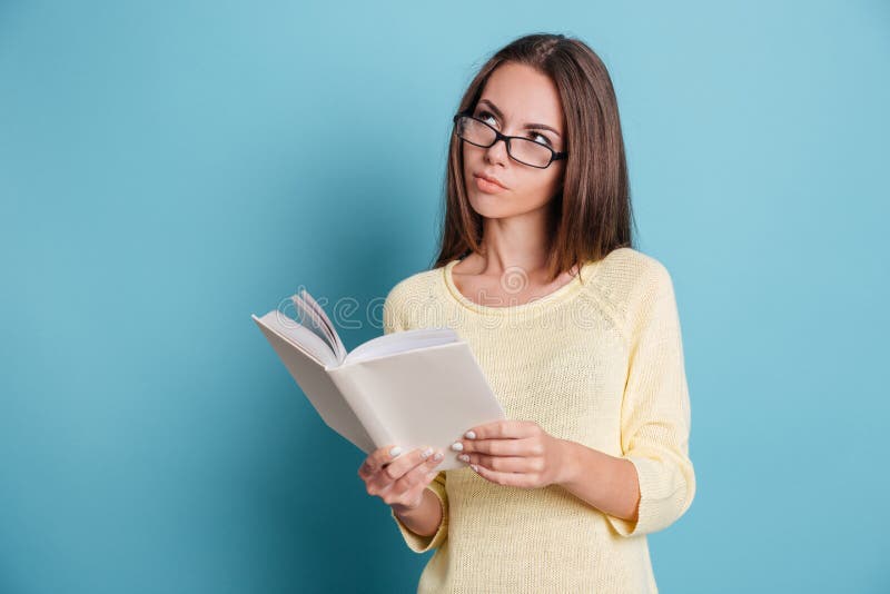 Pensive Smart Girl Thinking Something Holding Book Stock Photos - Free ...