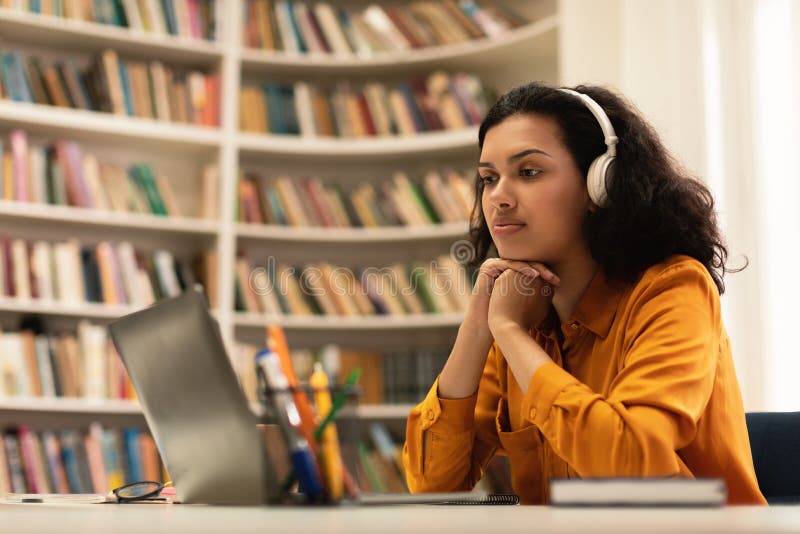 Pensive Student Lady Looking at Laptop Computer, Learning Online ...