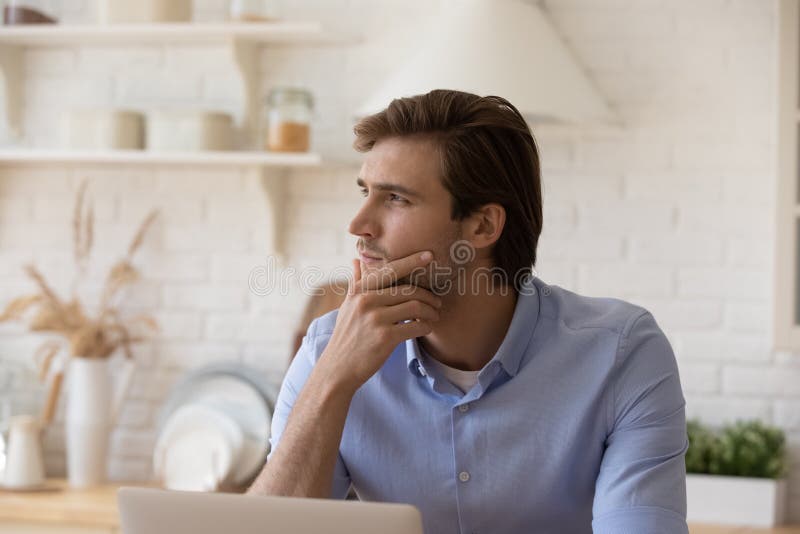 Pensive Young Businessman is Considering Problem Solution. Stock Photo ...