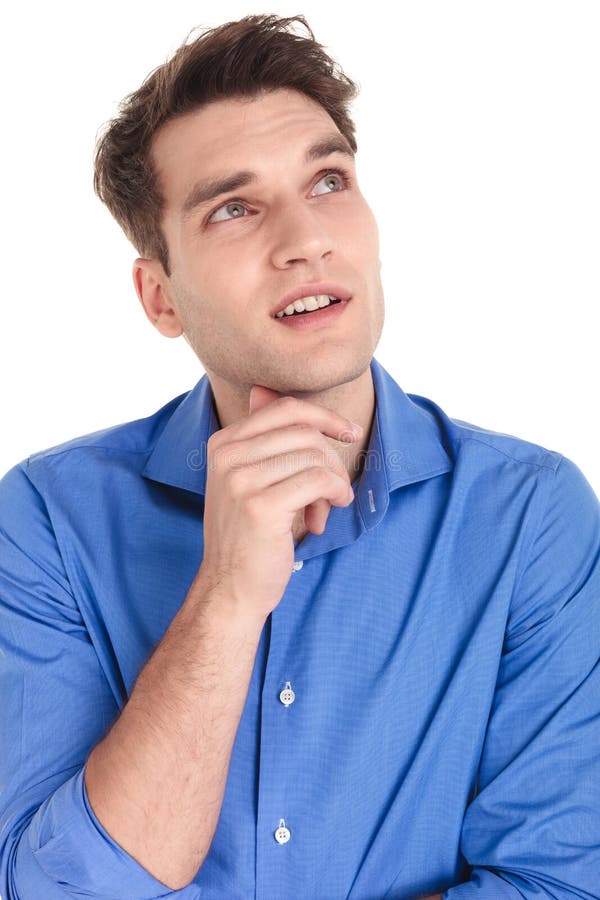 Pensive Young Man Looking Up Stock Photo - Image of look, shirt: 54534808