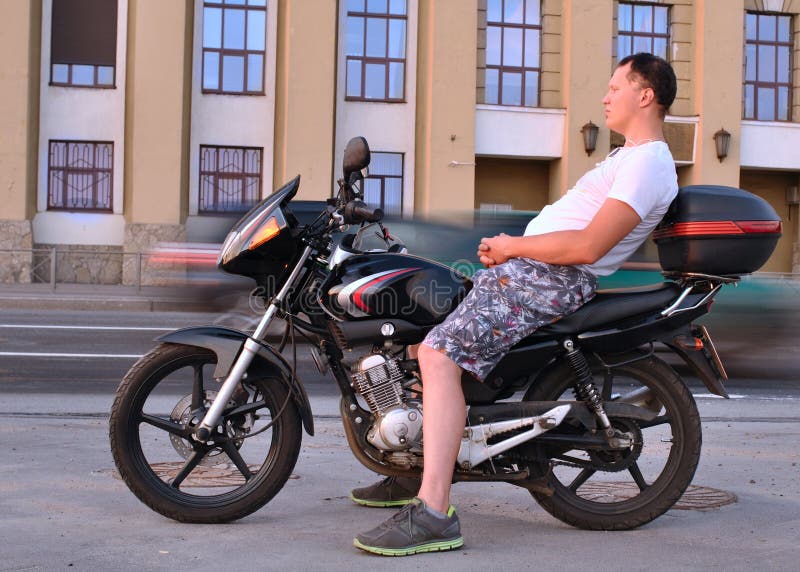 Pensive Young Man with Motorcycle Stock Image - Image of speed, bike ...