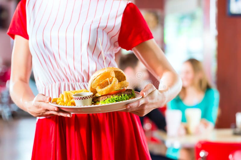 People in American Diner or Restaurant Eating Fast Food Stock Photo ...