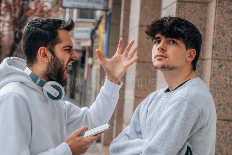 People Arguing in the Street Outdoors Stock Photo - Image of male ...
