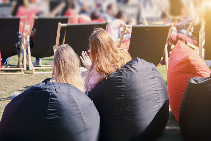 People in Armchairs Rest on the Outside with a Hard Day. Post ...