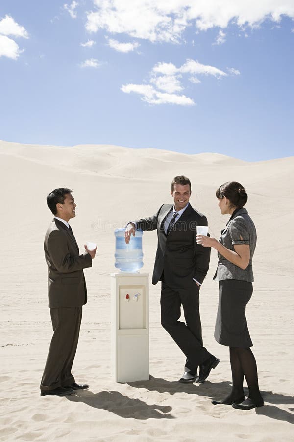 People Around Water Cooler in the Desert Stock Image - Image of cloud ...