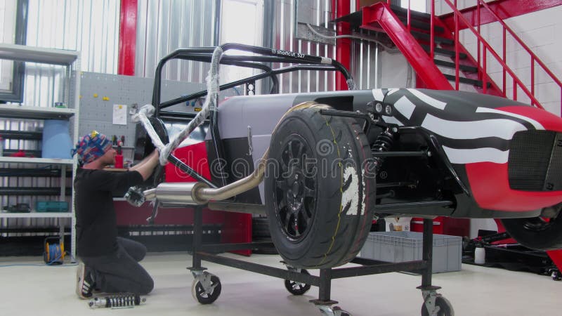 People Assemble Sport Car in Shortcut 527 Stock Video - Video of ...