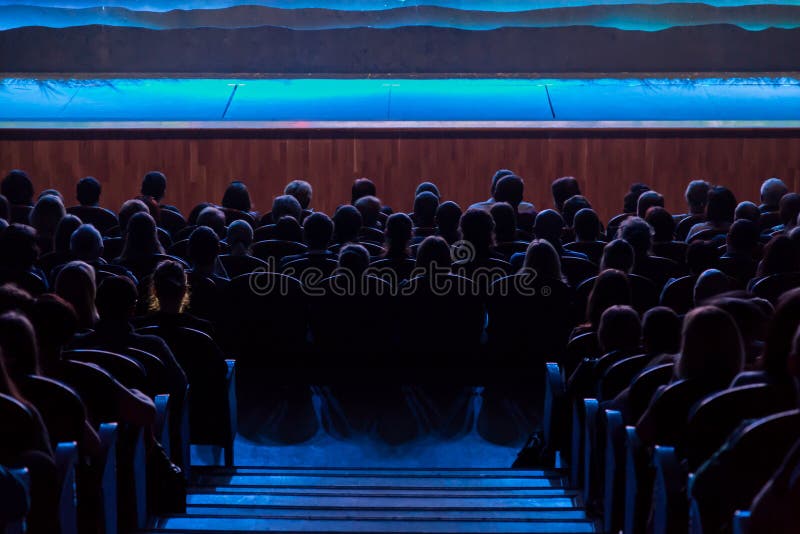 People in the Auditorium during the Performance. a Theatrical ...