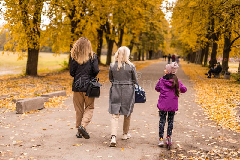 People in Autumn Park. Three Women in the Park. Stock Image - Image of ...