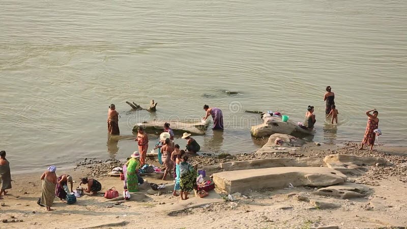 People Bathing and Washing Themselves on the River in Hampi. Stock ...