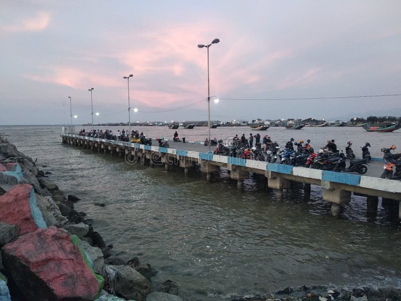 People on the Beach at Dusk, Central Java, Indonesia, July 12, 2022 ...