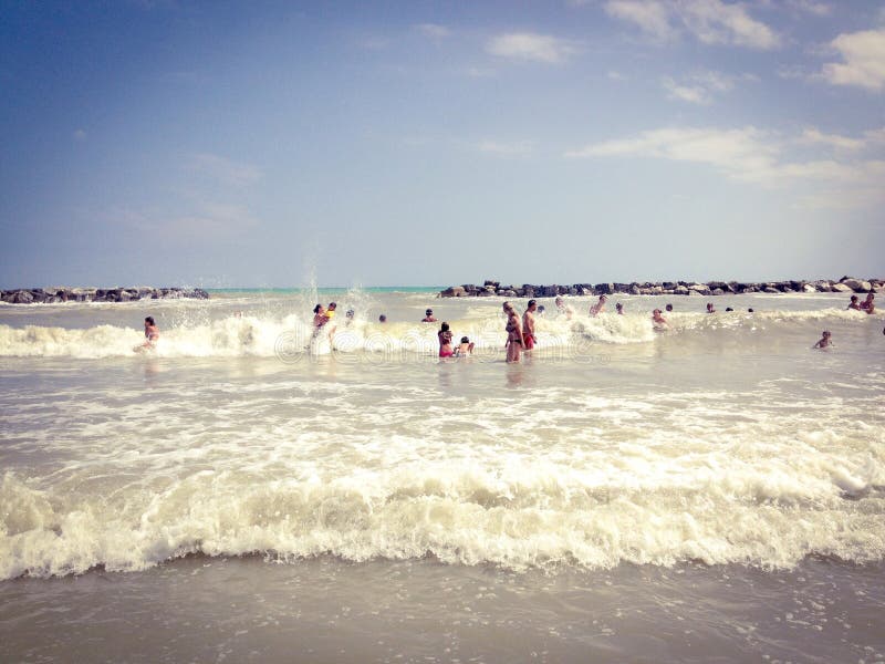 People on the beach editorial photo. Image of beach, rough - 44163356