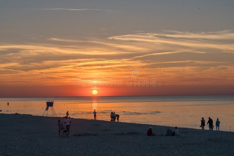 People on the Beach at Sunset Editorial Image - Image of holidays ...