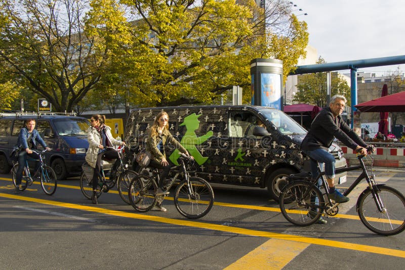 People with Bicycle on the Road of Berlin Editorial Stock Image - Image ...