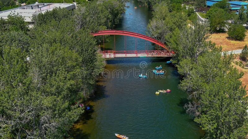 People in Boats Float the Boise River Under a Bridge Stock Image ...