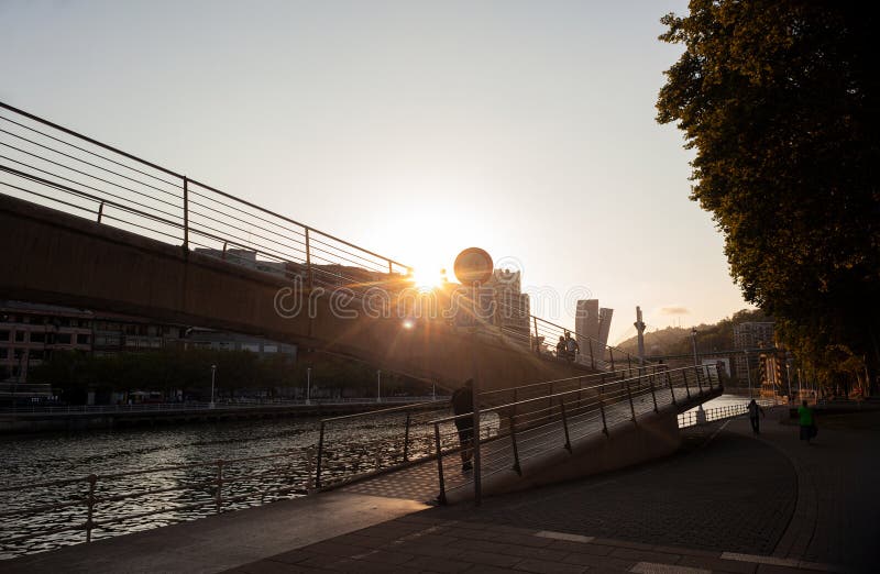 People on the Bridge with Sunset, Bilbao Editorial Stock Image - Image ...