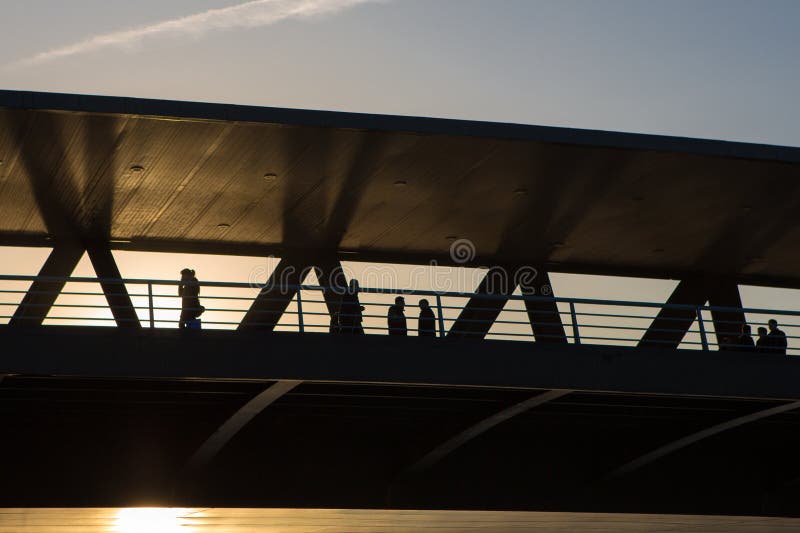 People on the Bridge with Sunset Stock Image - Image of standing, human ...