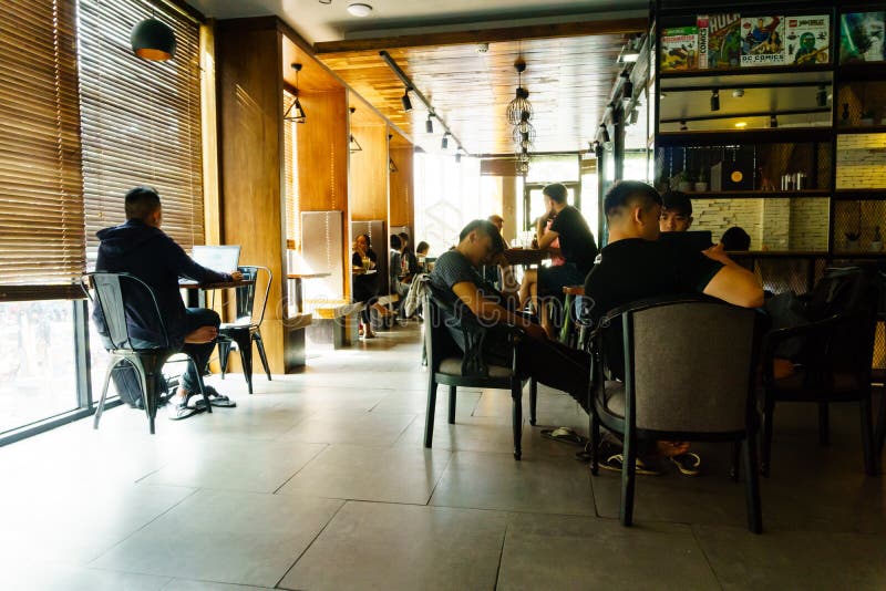 People in cafe at Saigon editorial photo. Image of indoors - 104576141