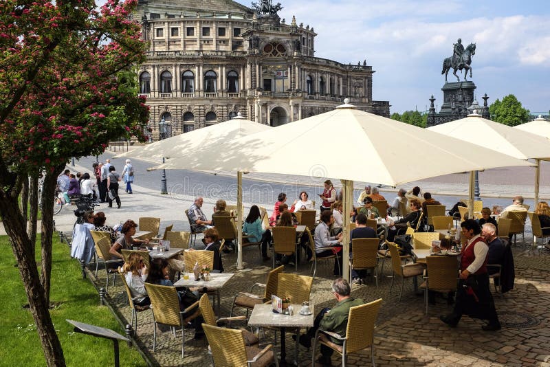 People in Cafe on Theaterplatz in Dresden, Germany. May 2014 Editorial ...