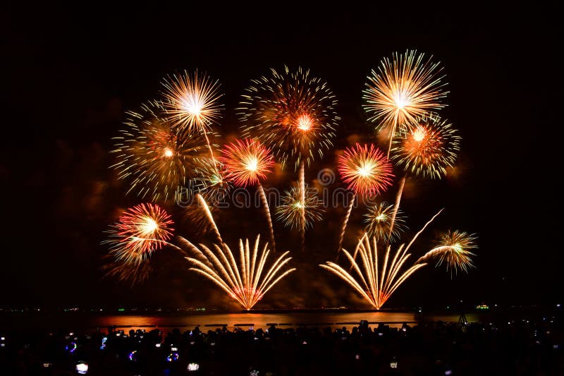 People Capturing Fireworks Show with Camera and Smart Phone Stock Image ...