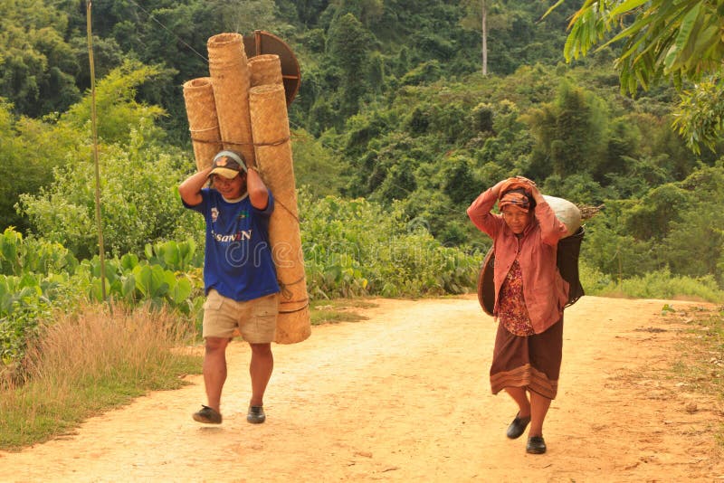 People Carrying Stuff Their Back Stock Photos - Free & Royalty-Free ...