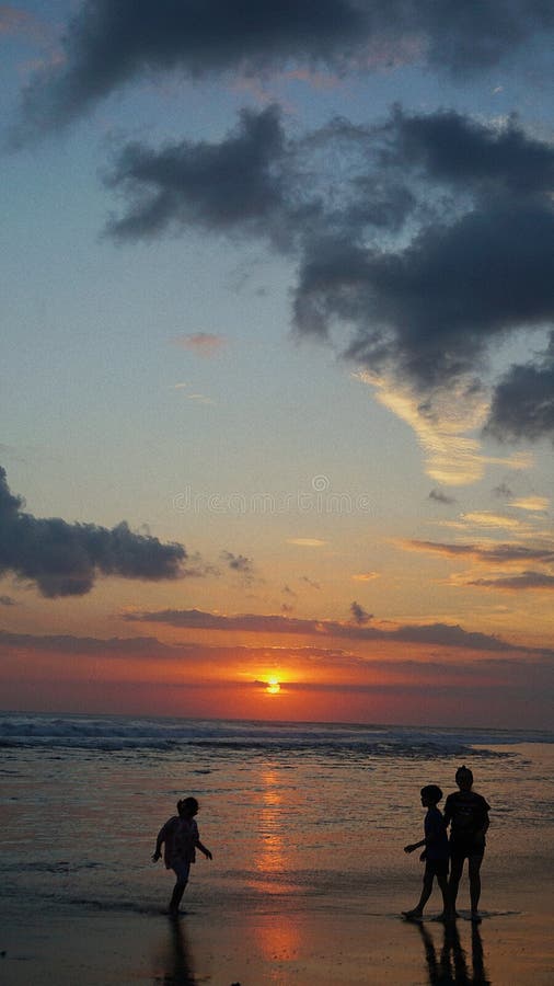 People catching sunset stock photo. Image of ocean, beach - 203225622