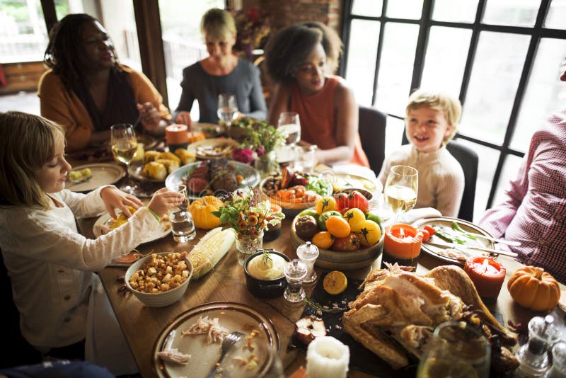 People Celebrating Thanksgiving Holiday Tradition Concept Stock Image ...