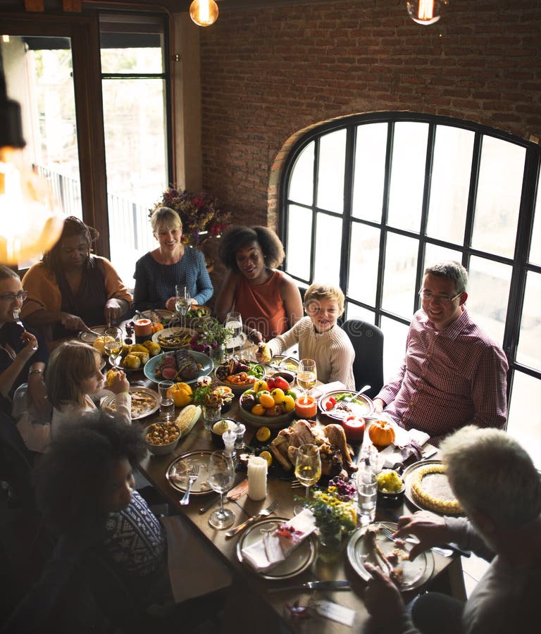People Celebrating Thanksgiving Holiday Tradition Concept Stock Image ...