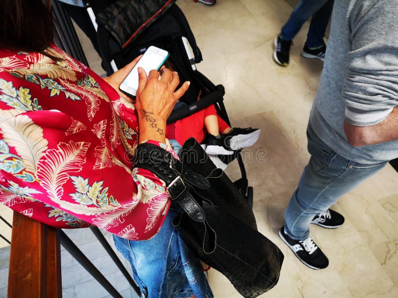 People with Cell Phones Waiting for Their Turn Stock Photo - Image of ...