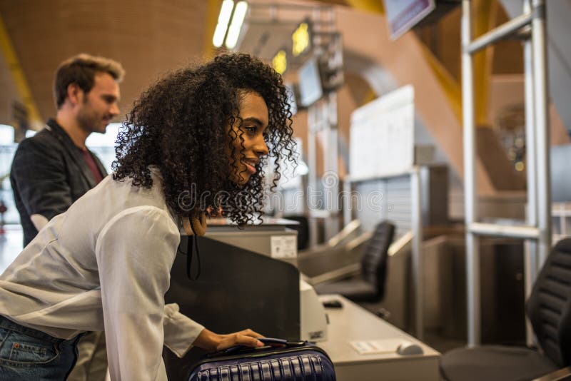 People Check-in Luggage at the Airport Stock Photo - Image of backpack ...