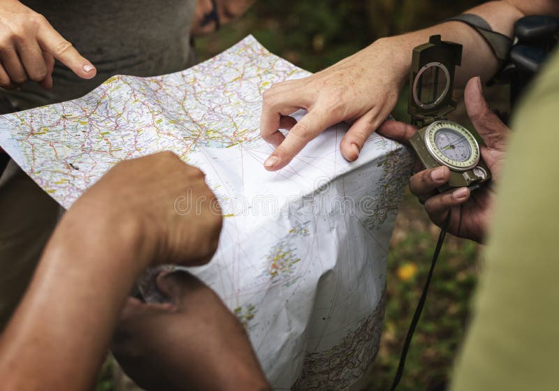 People Checking on the Map for Directions Stock Photo - Image of ...