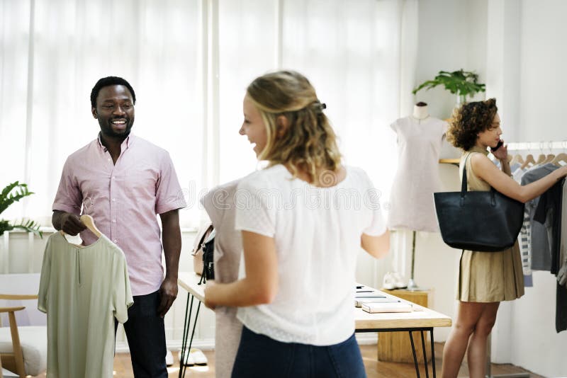 People Checking Out Clothes Stock Photo - Image of museum, people ...
