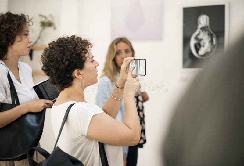 People Checking Out the Exhibition Stock Image - Image of frames, rare ...