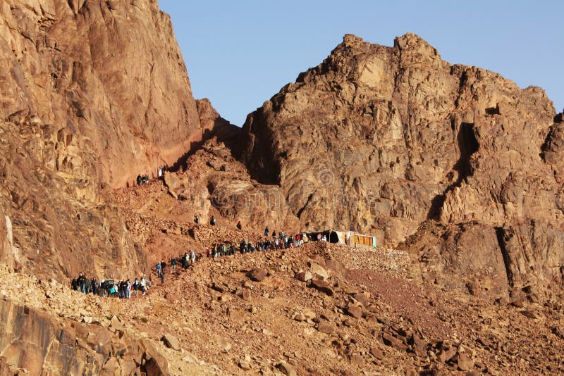 People Climbing Down the Mountain Stock Photo - Image of equipment ...
