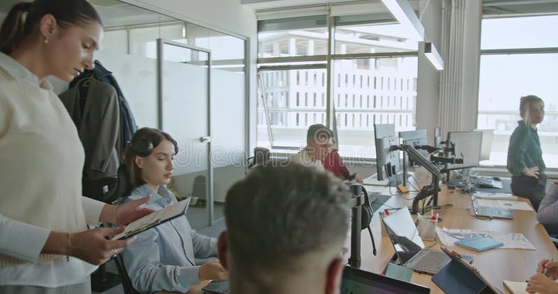 People Collaborating in a Modern Office on a Business Project ...