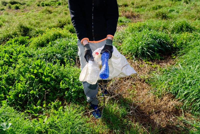 People Collect Garbage from Their Streets To Clean Their Fields of ...