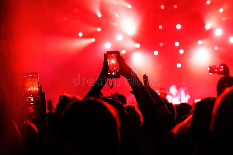 People at Concert Shooting Video or Photo Using Mobile Phones. Stock ...