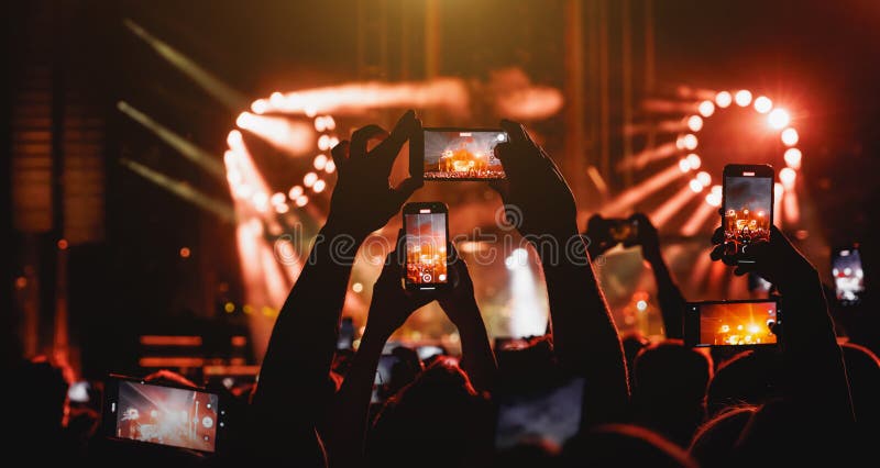 People at Concert Shooting Video or Photo Using Mobile Phones Stock ...