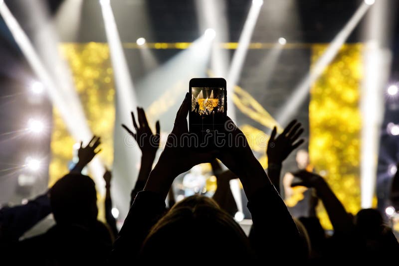 People at the Concert. Using a Smartphone Stock Image - Image of ...