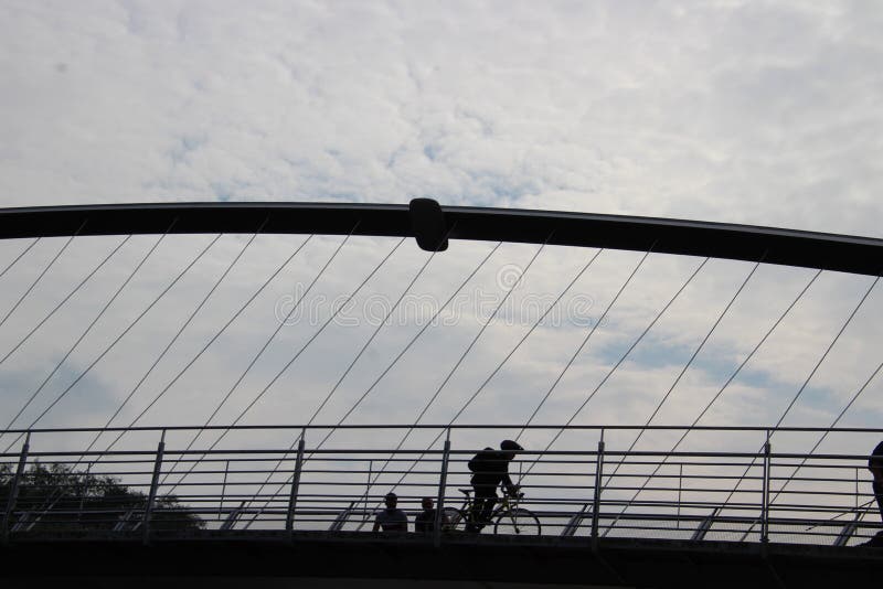 People crossing a bridge editorial image. Image of pedestrians - 229704360