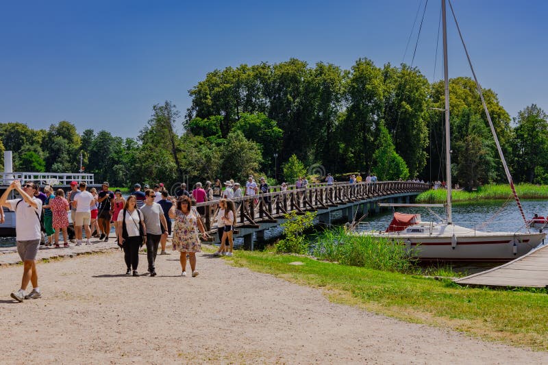 People Crossing the Bridge To Trakai Castle Editorial Photography ...