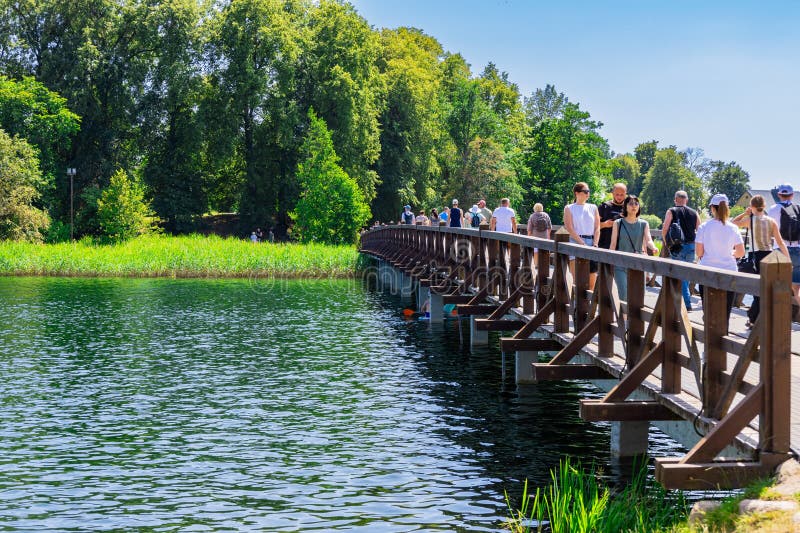 People Crossing the Bridge To Trakai Castle Editorial Photography ...