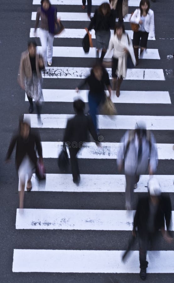 People crossing the street stock image. Image of girls - 1043947
