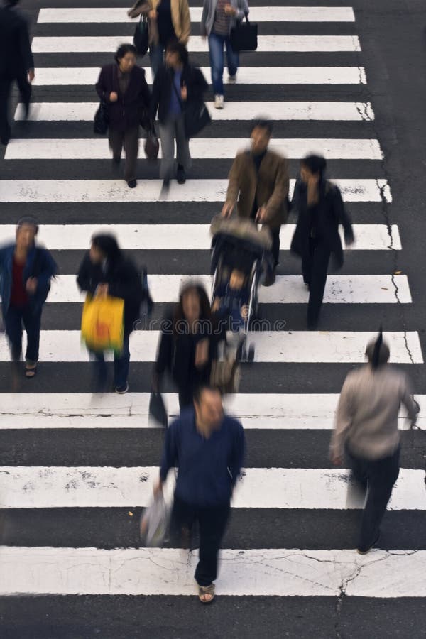 People crossing the street stock image. Image of lifestyle - 6970287