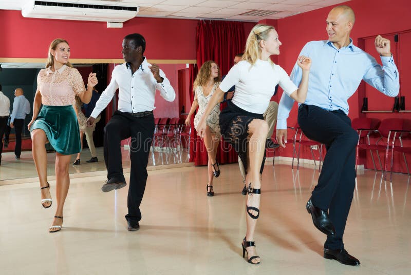 People Dancing Rock-and-roll in Pairs Stock Image - Image of positive ...