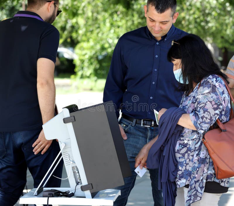 People are Demo Voting on Electronic Voting Machine for Elections in ...