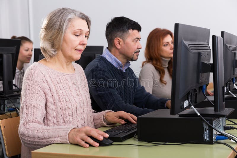 People of Different Ages Learning To Use Computers Stock Photo - Image ...